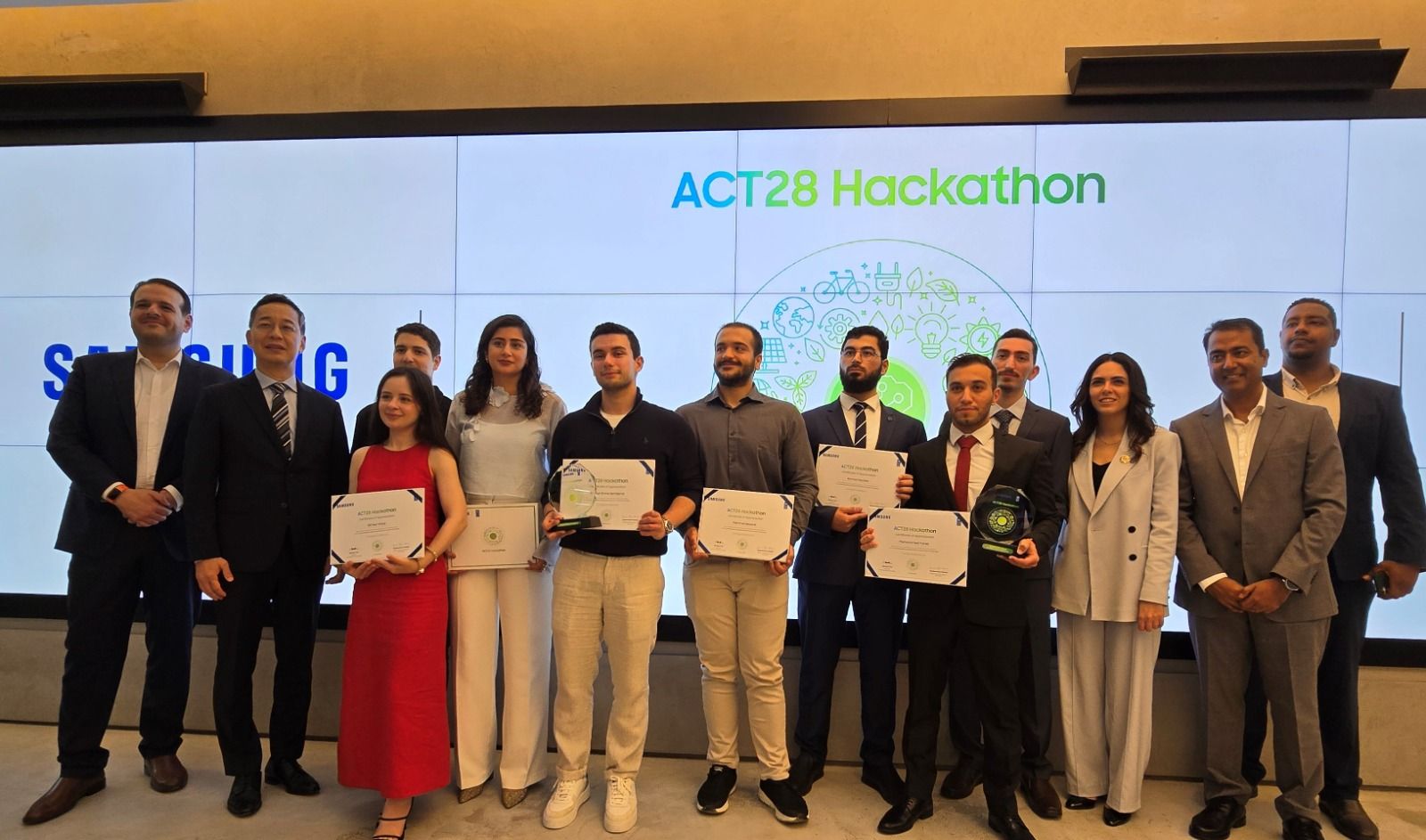 Samsung and UNDP award winners of 'ACT28 AI for Climate' hackathon at The UAE’s AI Retreat 2024 ...